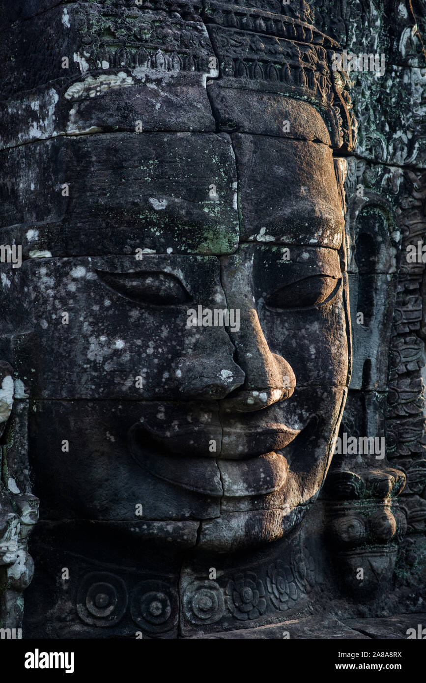 Stone head at Bayon, Angkor Thom temple, Angkor Wat complex, Siem Reap ...