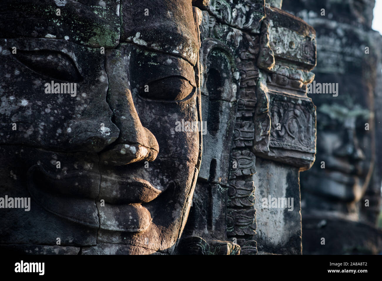 Stone carved Buddha heads in Bayon at the Angkor Thom temple in Angkor ...