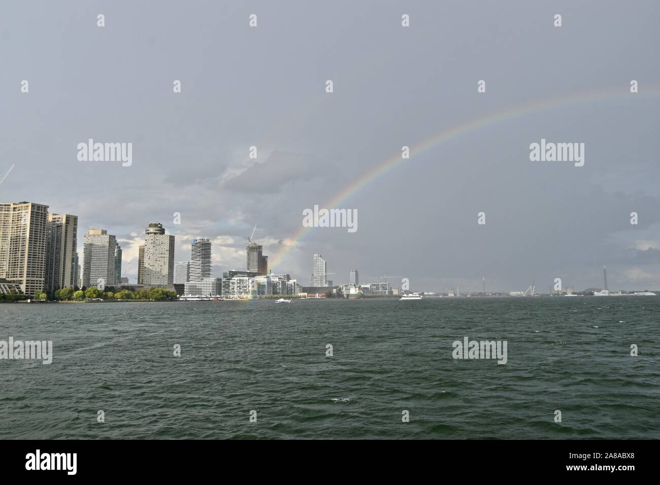 A Rainbow over the city of Toronto, Canada and Lake Ontario as seen ...