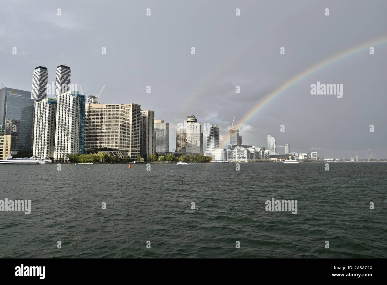 A Rainbow over the city of Toronto, Canada and Lake Ontario as seen ...