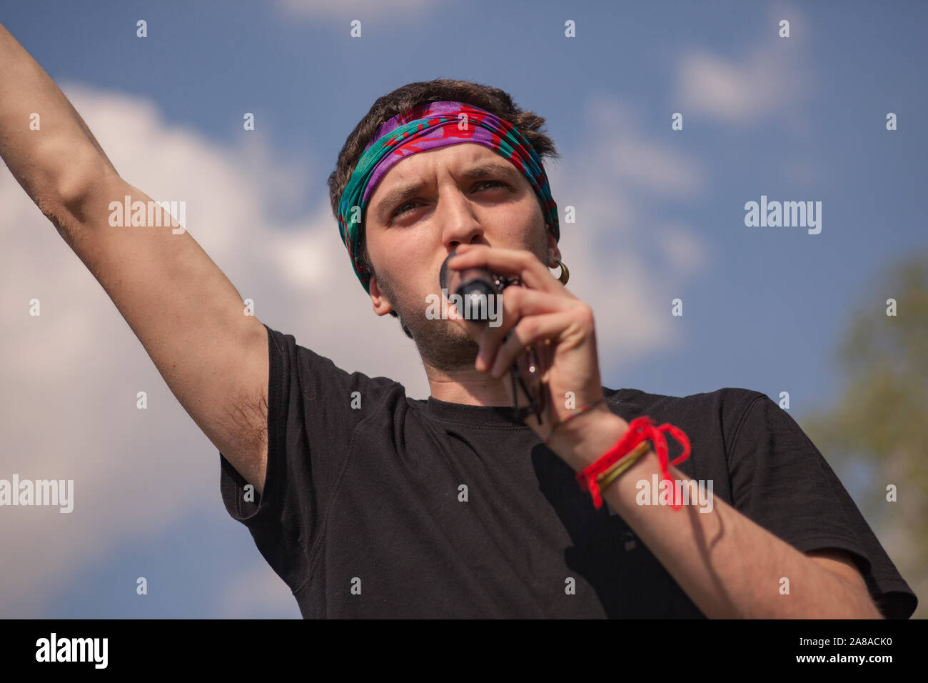 Hand holding microphone mouth singing hi-res stock photography and ...