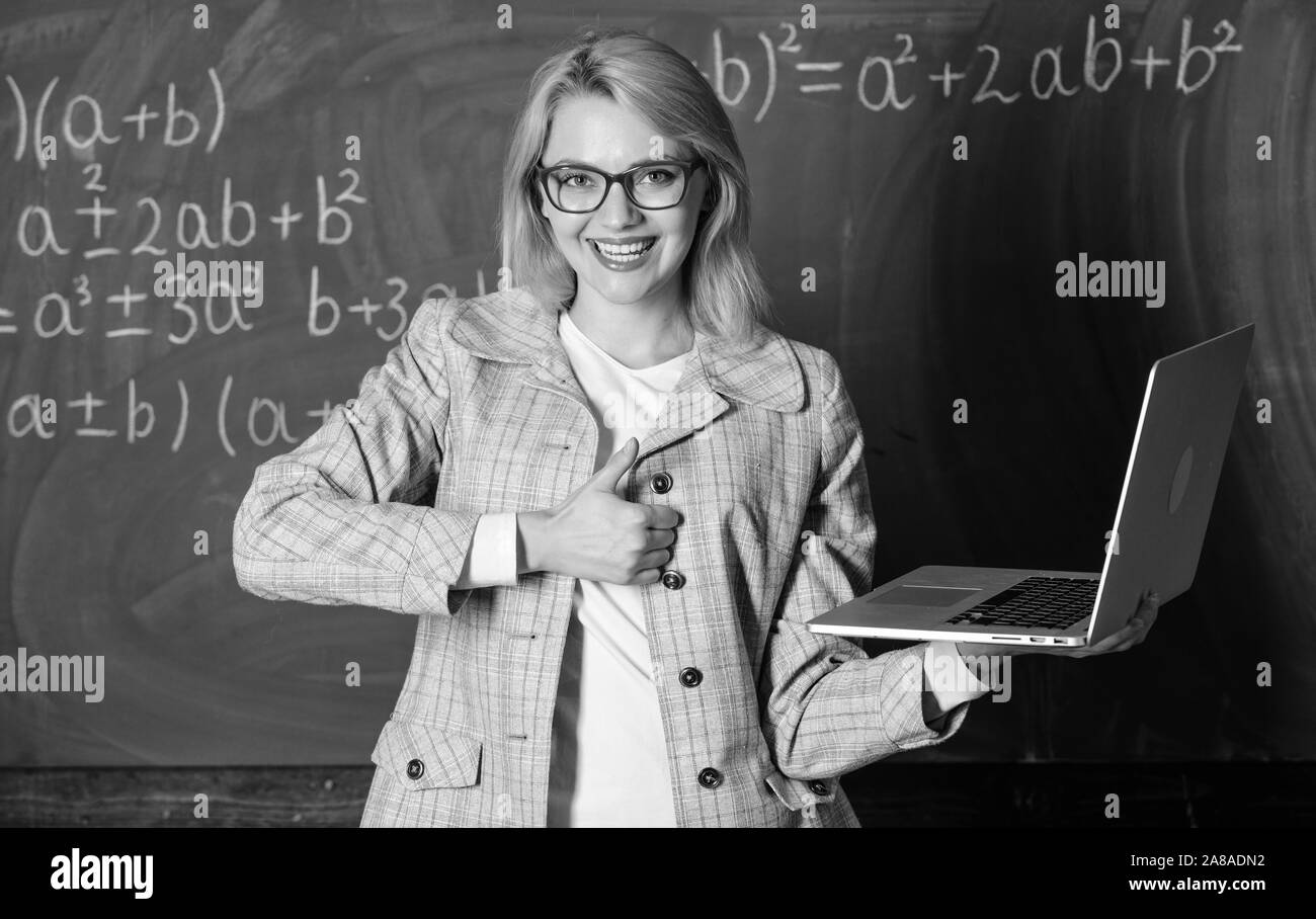 Online schooling concept. Educator smart clever lady with modern laptop ...