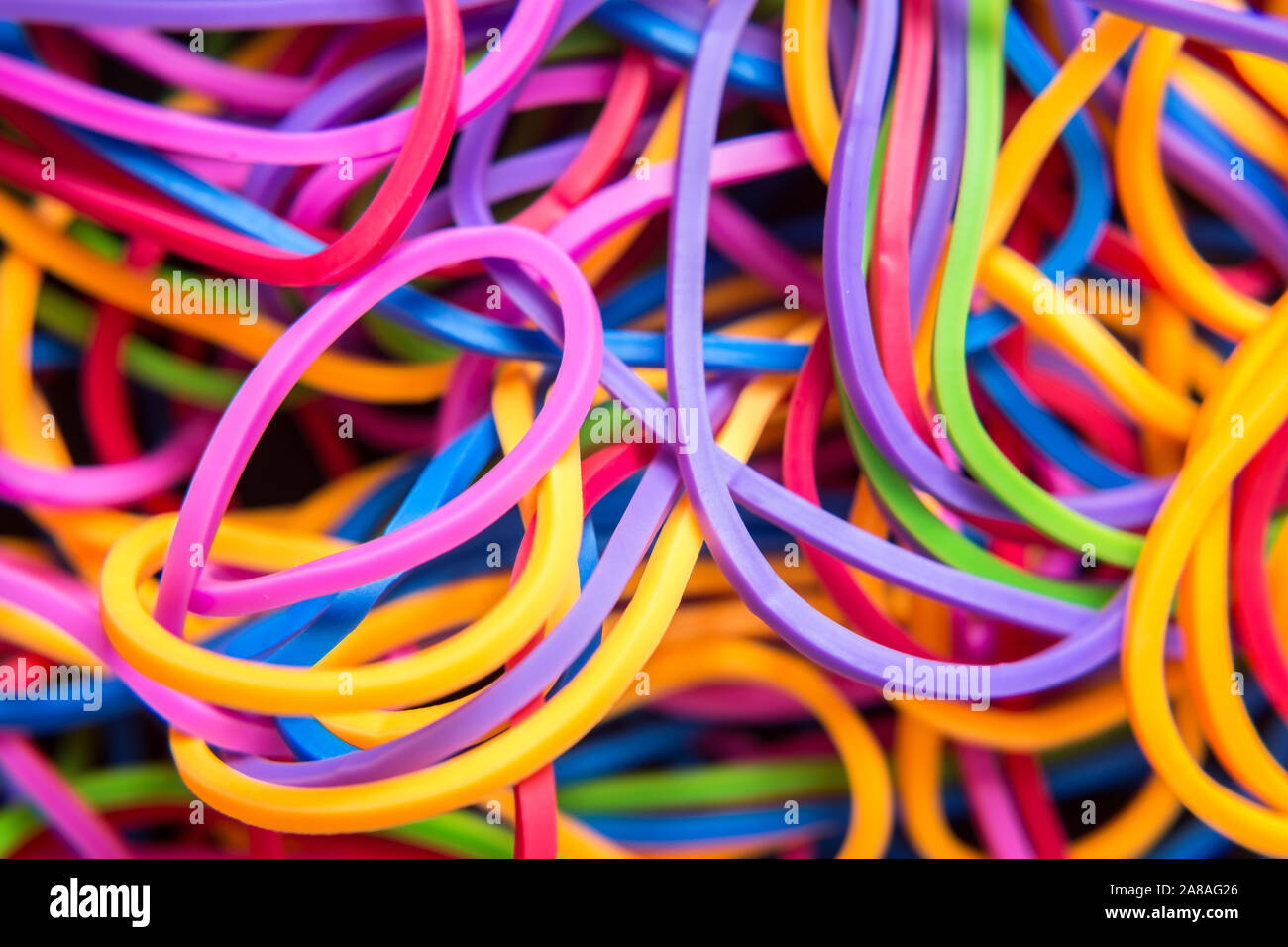 Colorful rainbow colors rubber bands Stock Photo - Alamy