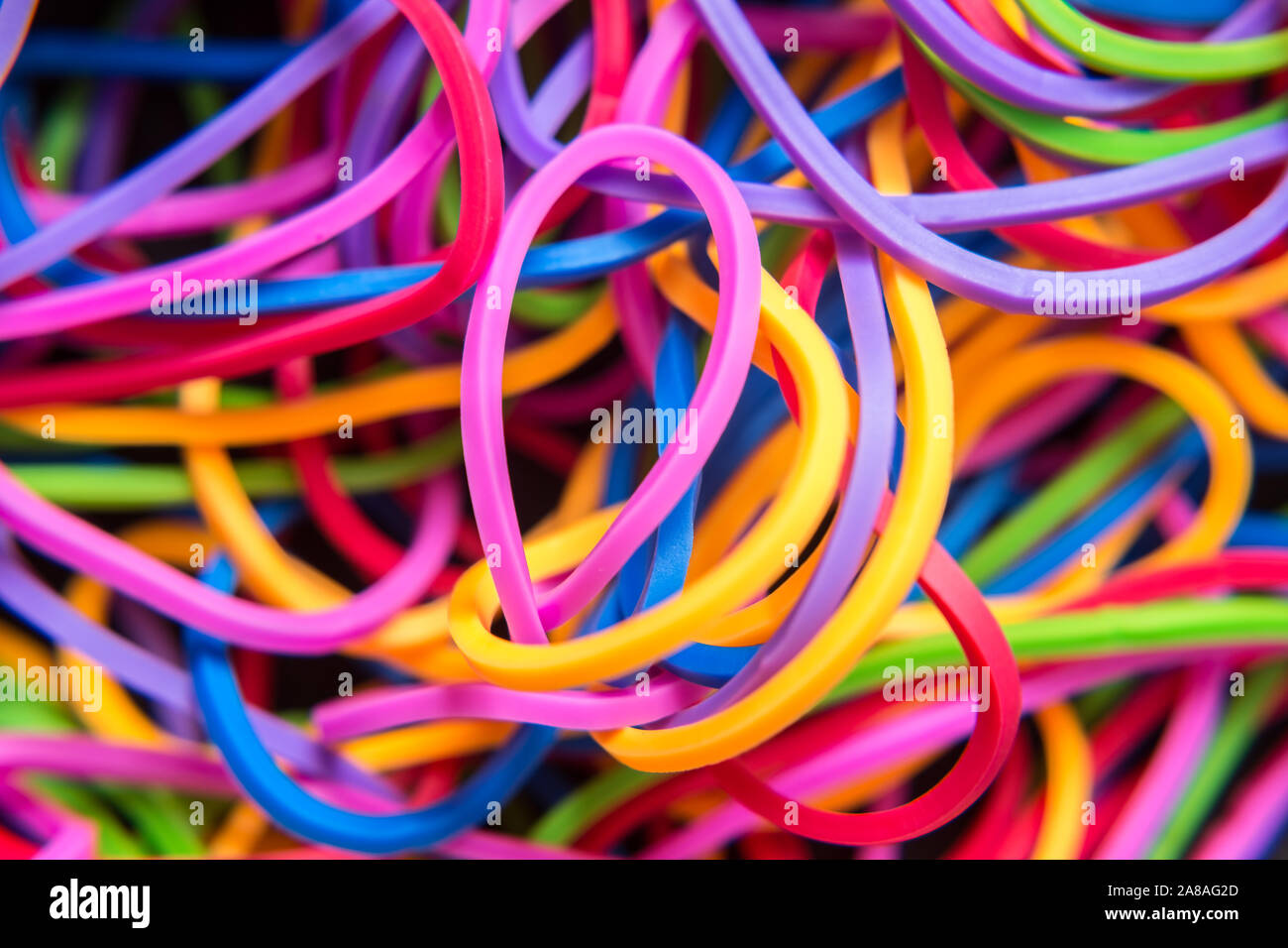 Colorful rainbow colors rubber bands Stock Photo - Alamy