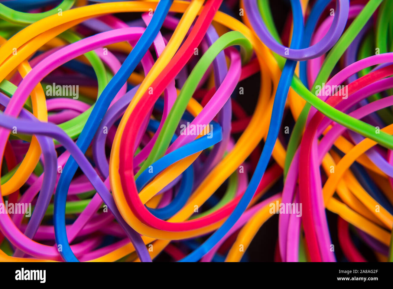 Colorful rainbow colors rubber bands Stock Photo - Alamy