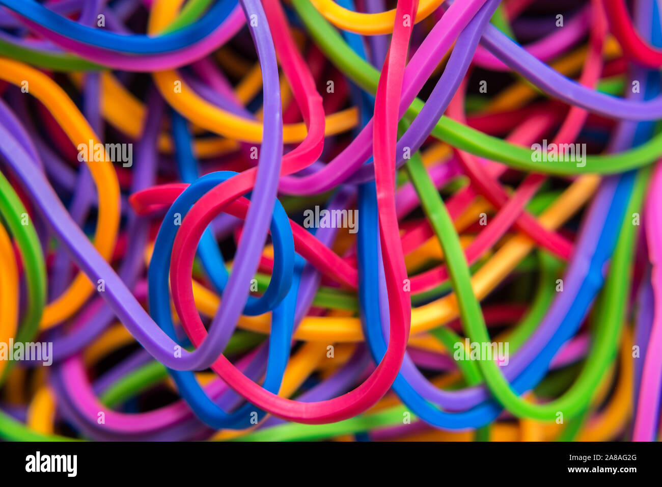 Colorful rainbow colors rubber bands Stock Photo - Alamy