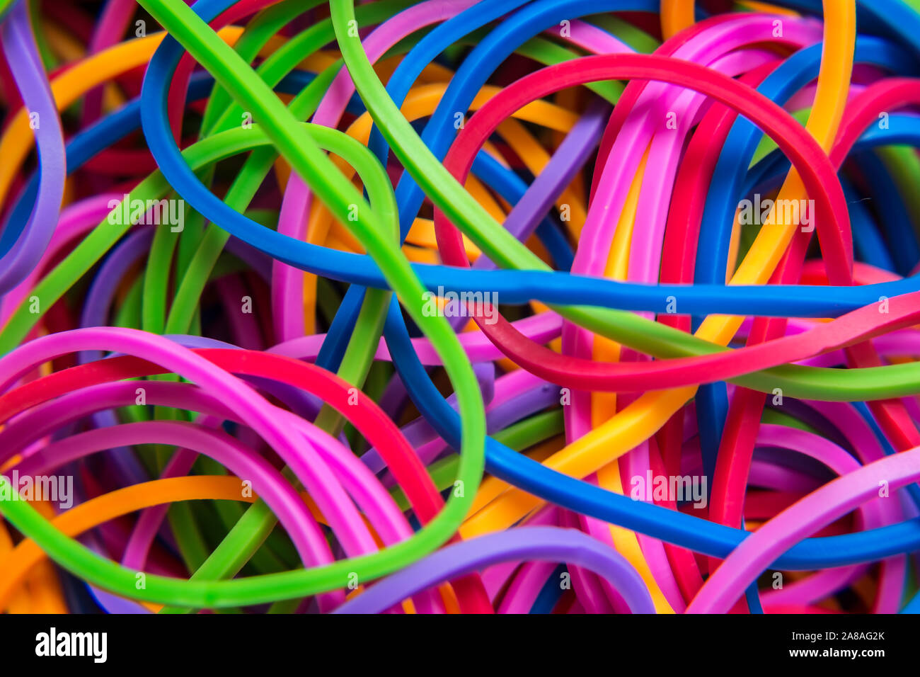 Colorful rainbow colors rubber bands Stock Photo - Alamy