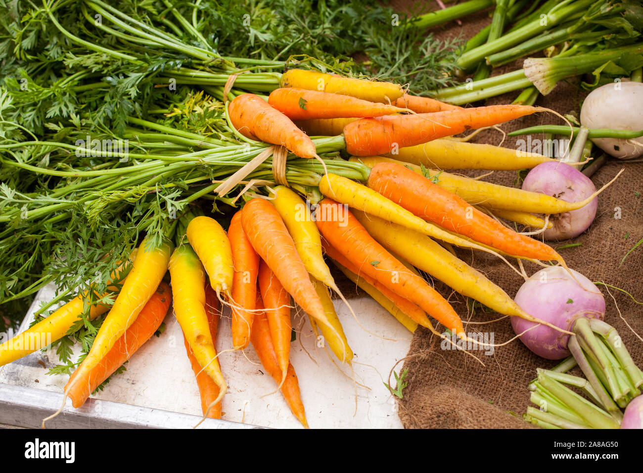 Vegetables on a market stall selling fresh home grown produce Stock ...
