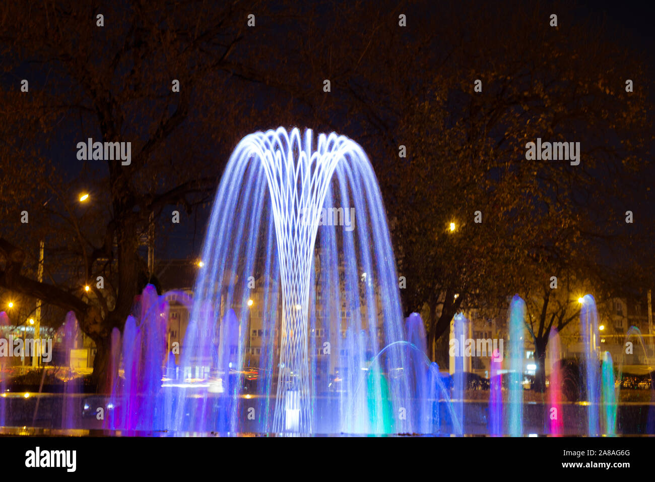 The colorful of fountain at night Stock Photo - Alamy