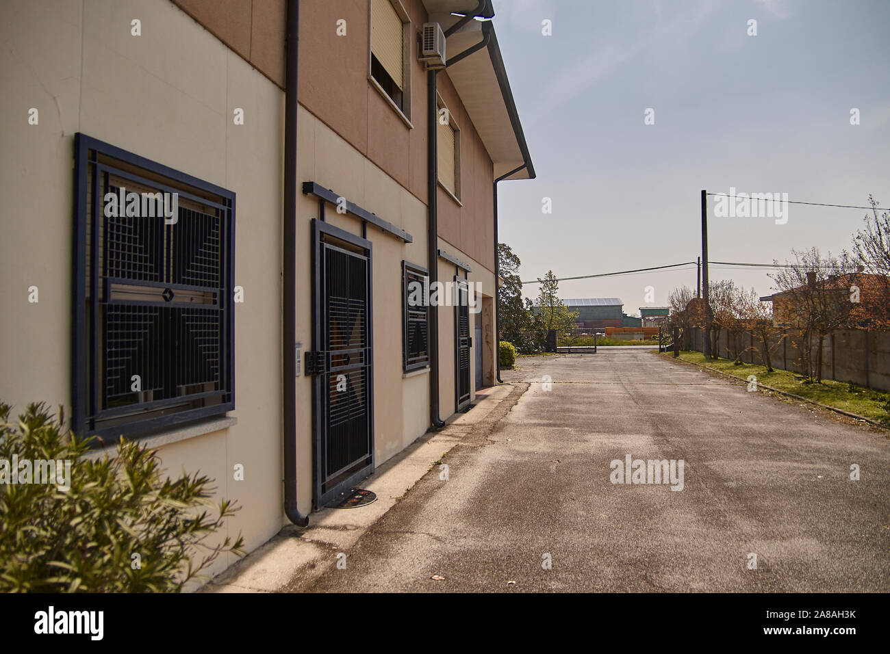 Side view of a two-family house Stock Photo - Alamy