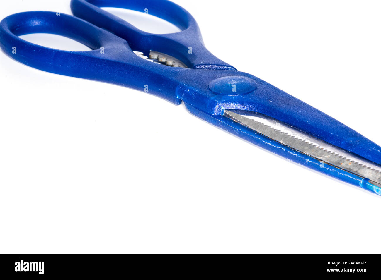 Dark blue scissors isolated on a white background Stock Photo - Alamy