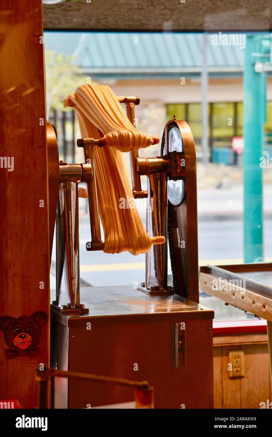 Taffy pulling machine hi-res stock photography and images - Alamy