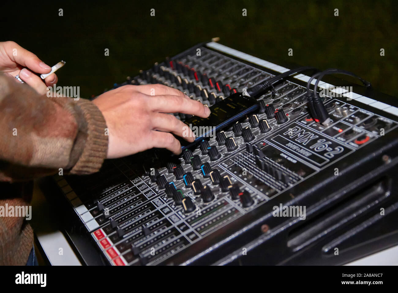 Mixing the music Stock Photo - Alamy
