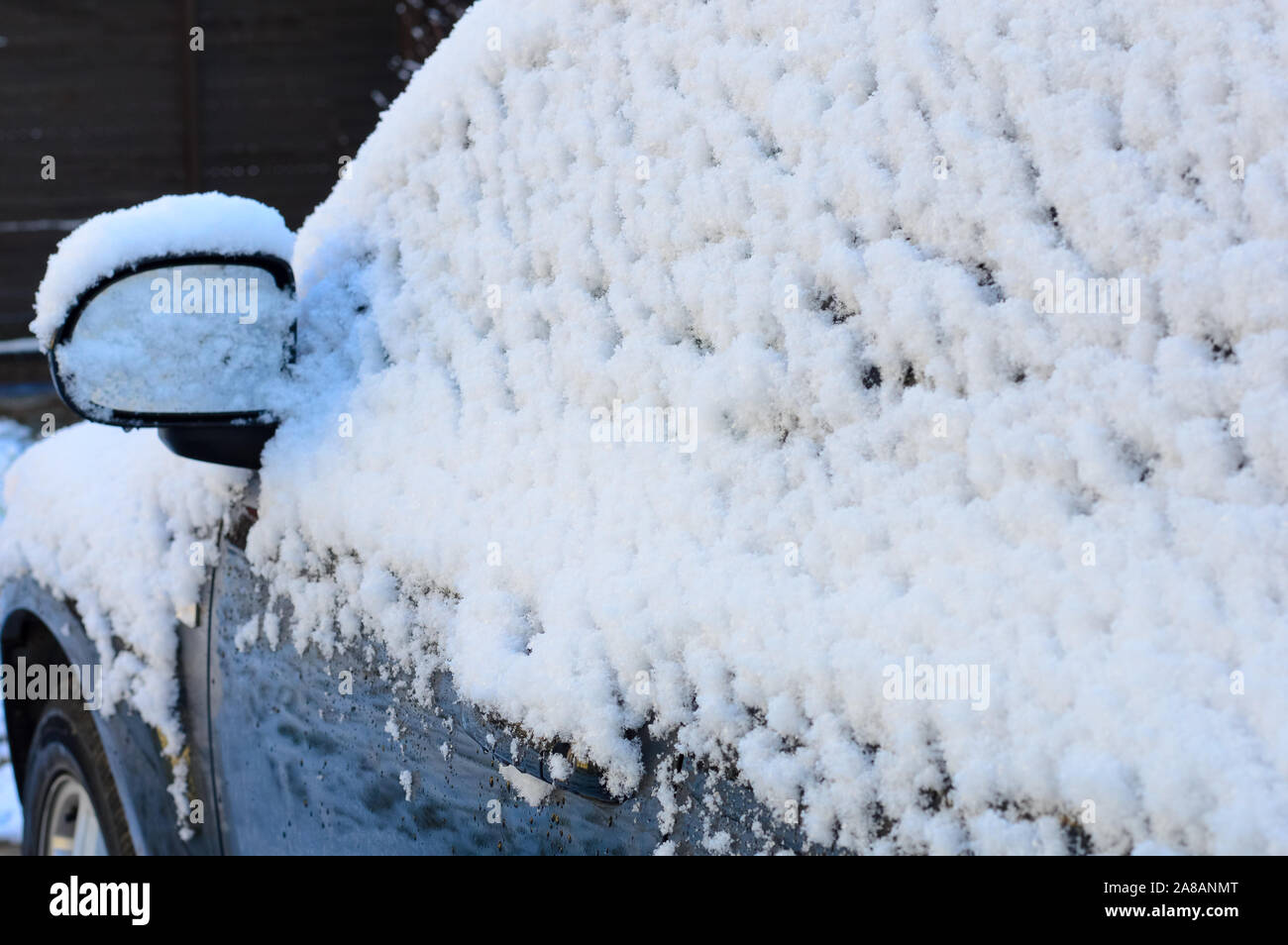 snow by car in a frosty winter day after snowfall and bad weather Stock ...