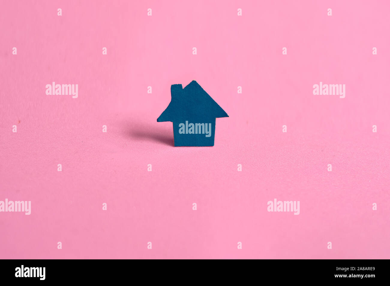 New home on pink isolated background, real estate concept. Acquisition ...