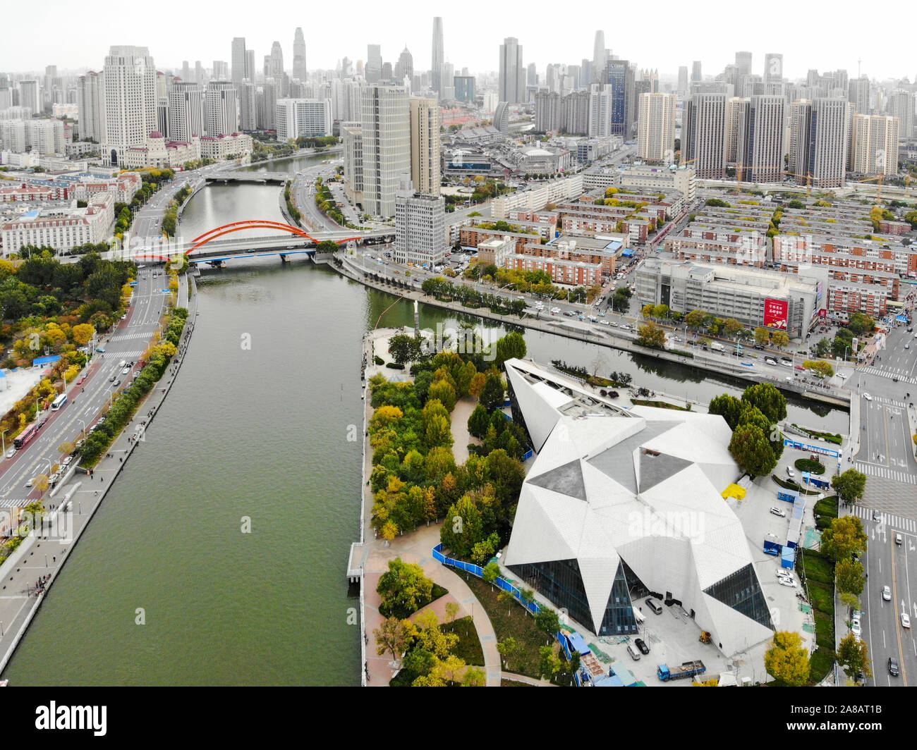 Aerial view of Tianjin cityscape with Haihe river and skyscrapers ...