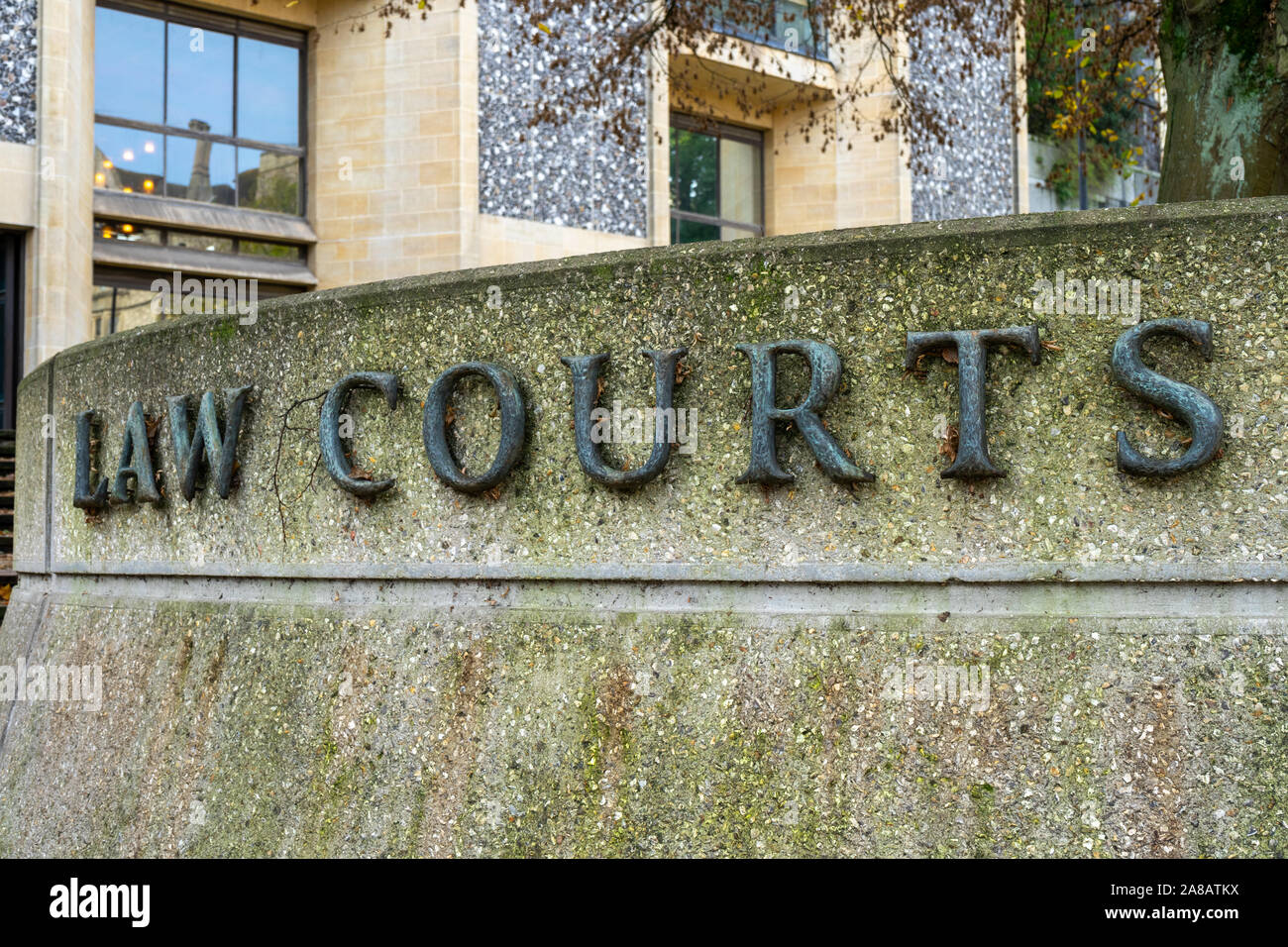 a sign reading Law Courts in the exterior of a building Stock Photo - Alamy
