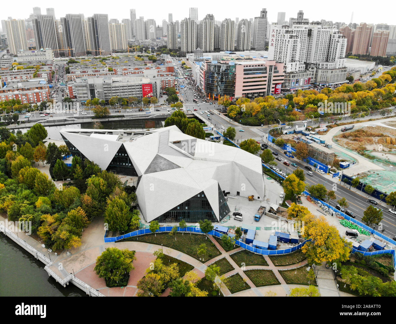 Aerial view of Tianjin cityscape with Haihe river and skyscrapers ...