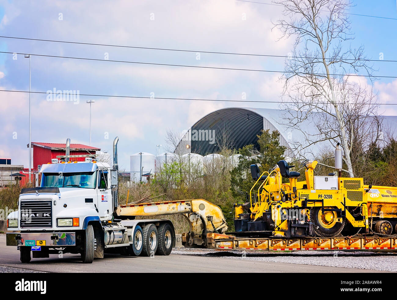 A Mack Granite truck hauls snow removal equipment at the Tennessee ...