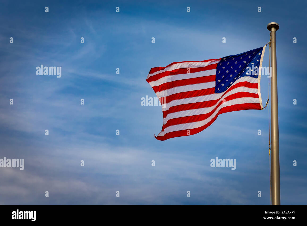 The American flag waves in the wind Stock Photo - Alamy