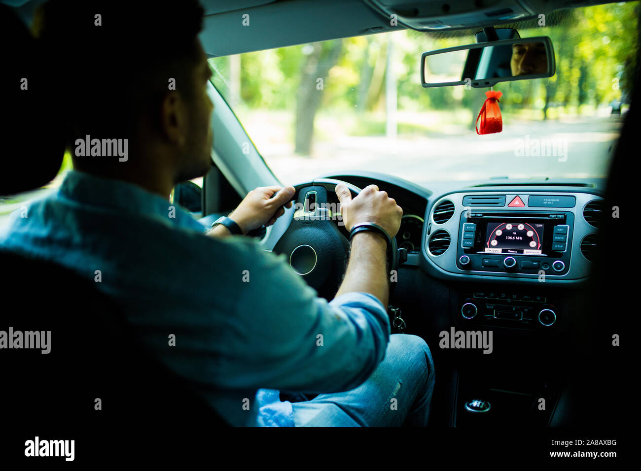 Man sitting in back van hi-res stock photography and images - Alamy
