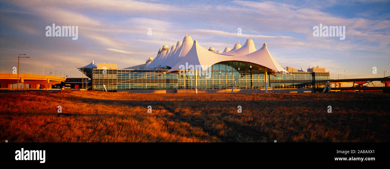 Clouded sky over an airport, Denver International Airport, Denver ...