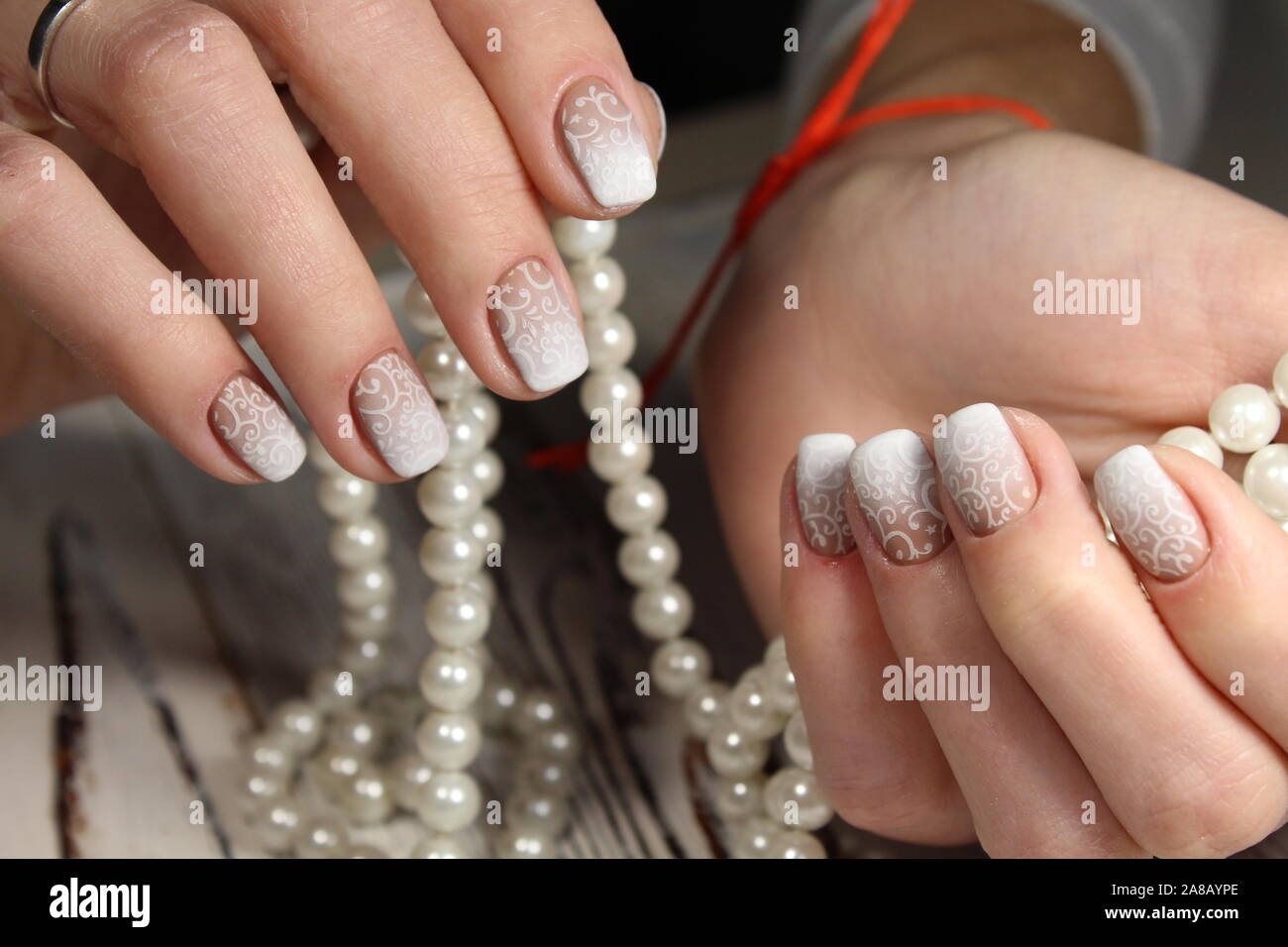 Closeup photo of a beautiful female hands with elegant manicure Stock ...