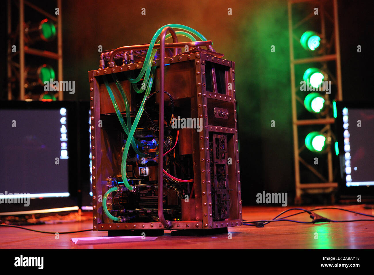 gamers competing in cyber games using computers, gaming consoles and ...