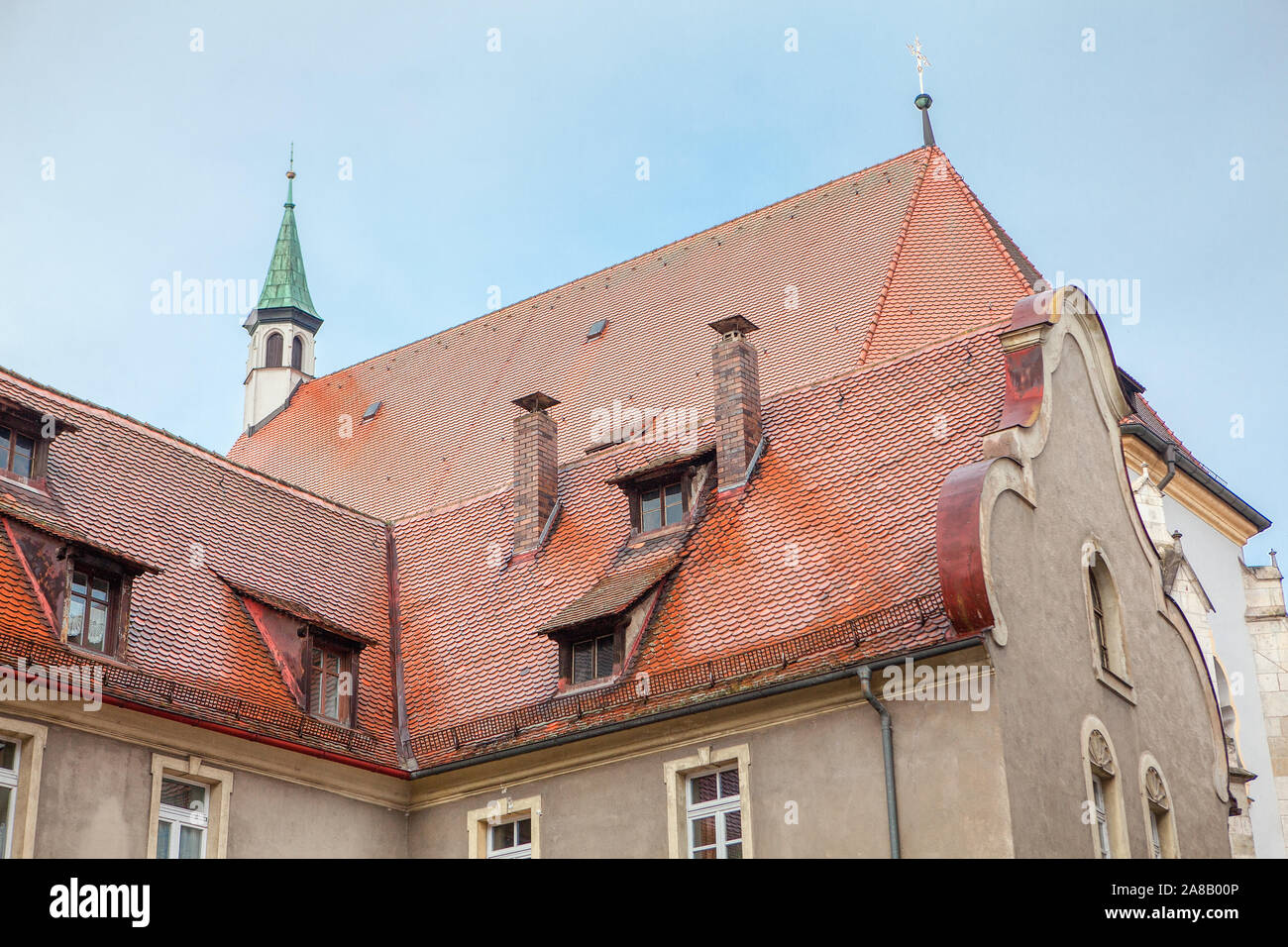 house with spire and red roofs Stock Photo - Alamy