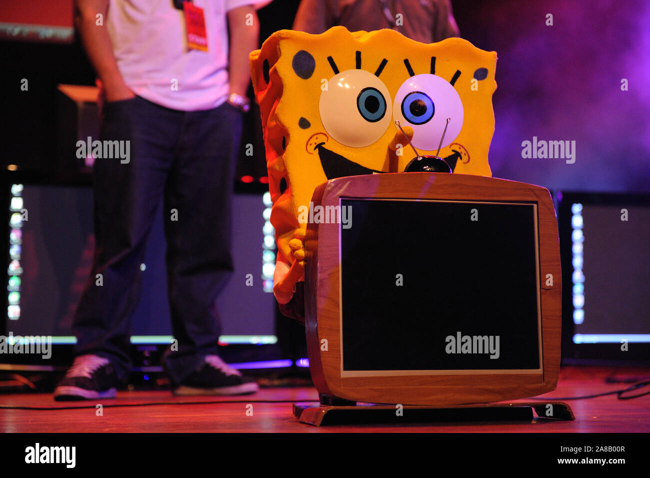 gamers competing in cyber games using computers, gaming consoles and ...