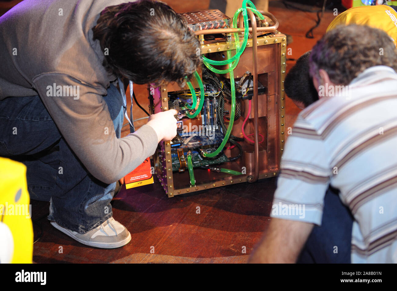 gamers competing in cyber games using computers, gaming consoles and ...