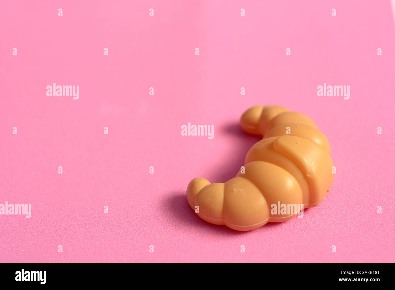 Toys for kids in food theme. One Croissant on isolated background. Food ...