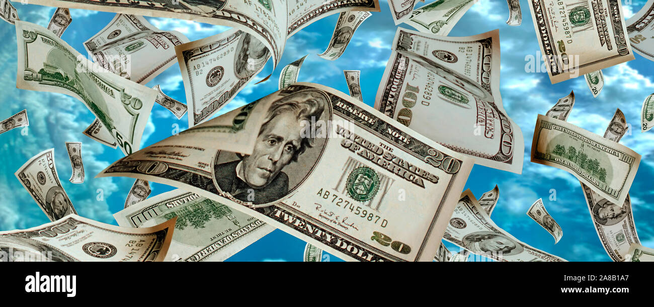 US paper money floating in sky Stock Photo - Alamy
