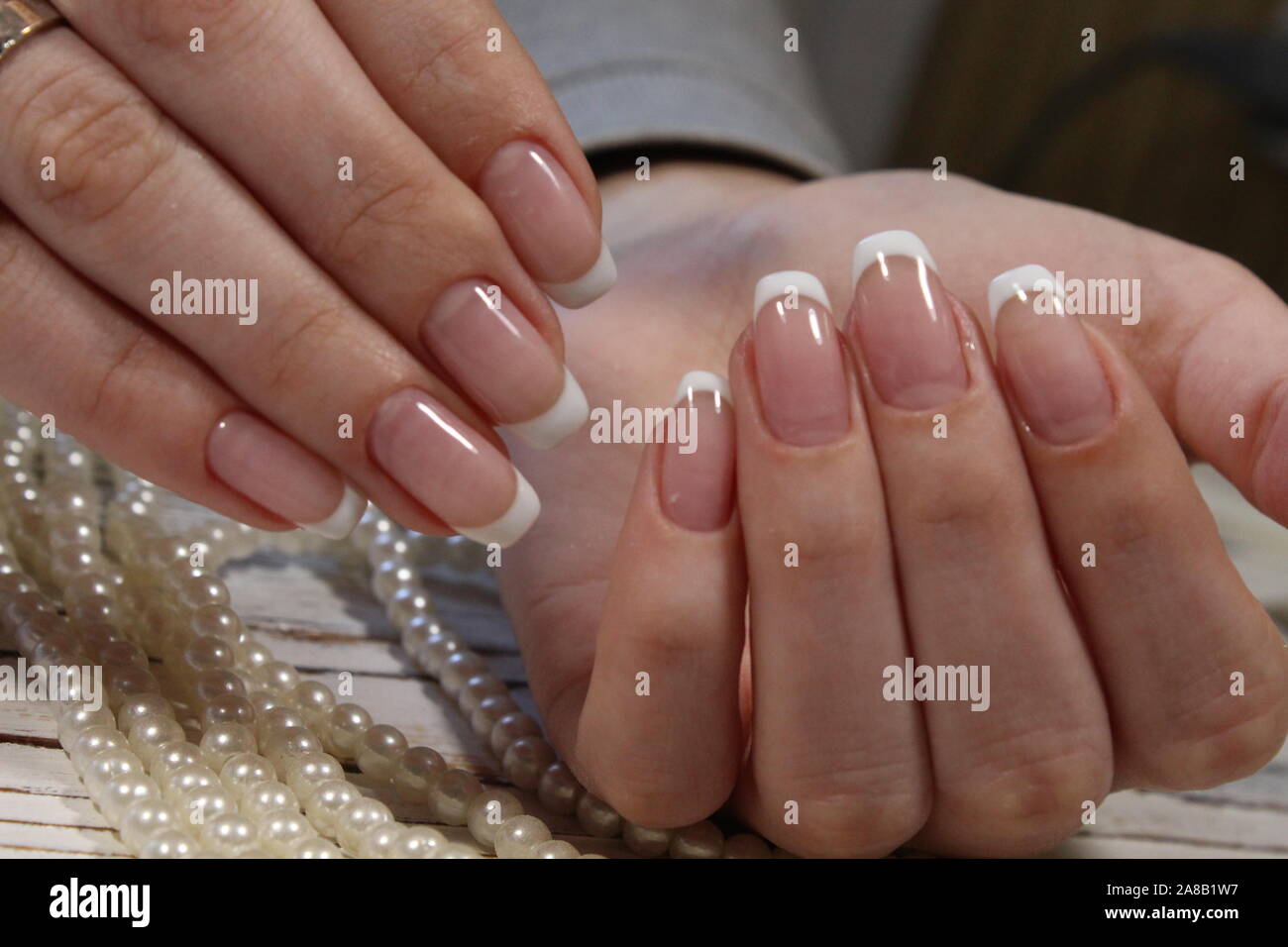 Closeup photo of a beautiful female hands with elegant manicure Stock ...