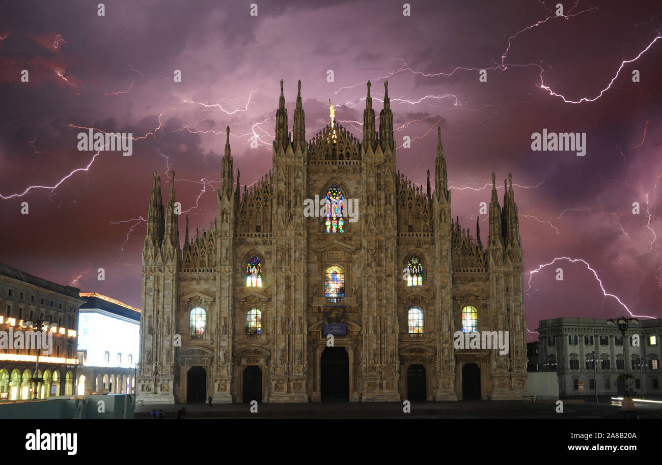 Milan Cathedral with lightning at night Stock Photo - Alamy