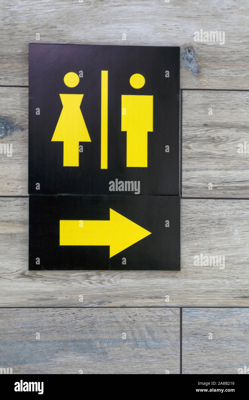 Toilet sign. Signage indicating location or toilet position for men and ...