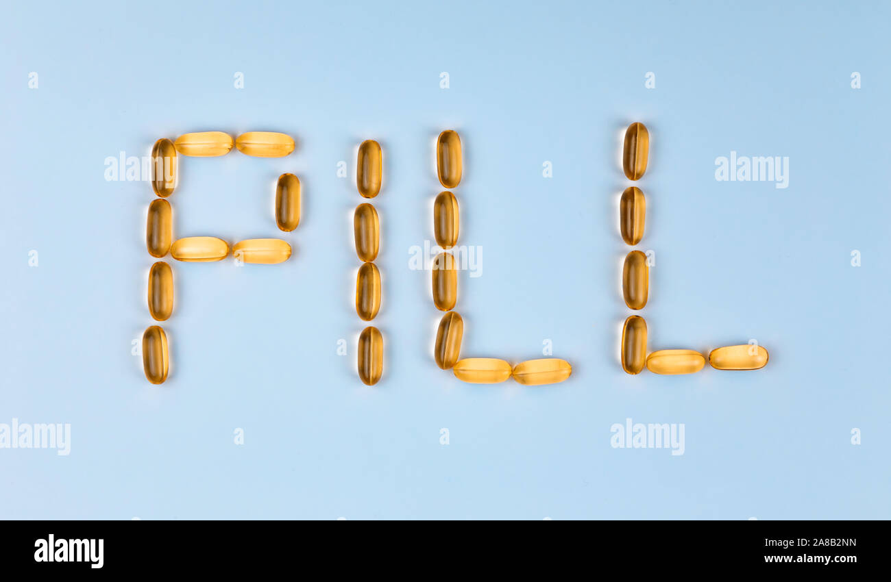 The word Pill is laid out with tablets. The word Pill is laid out with ...