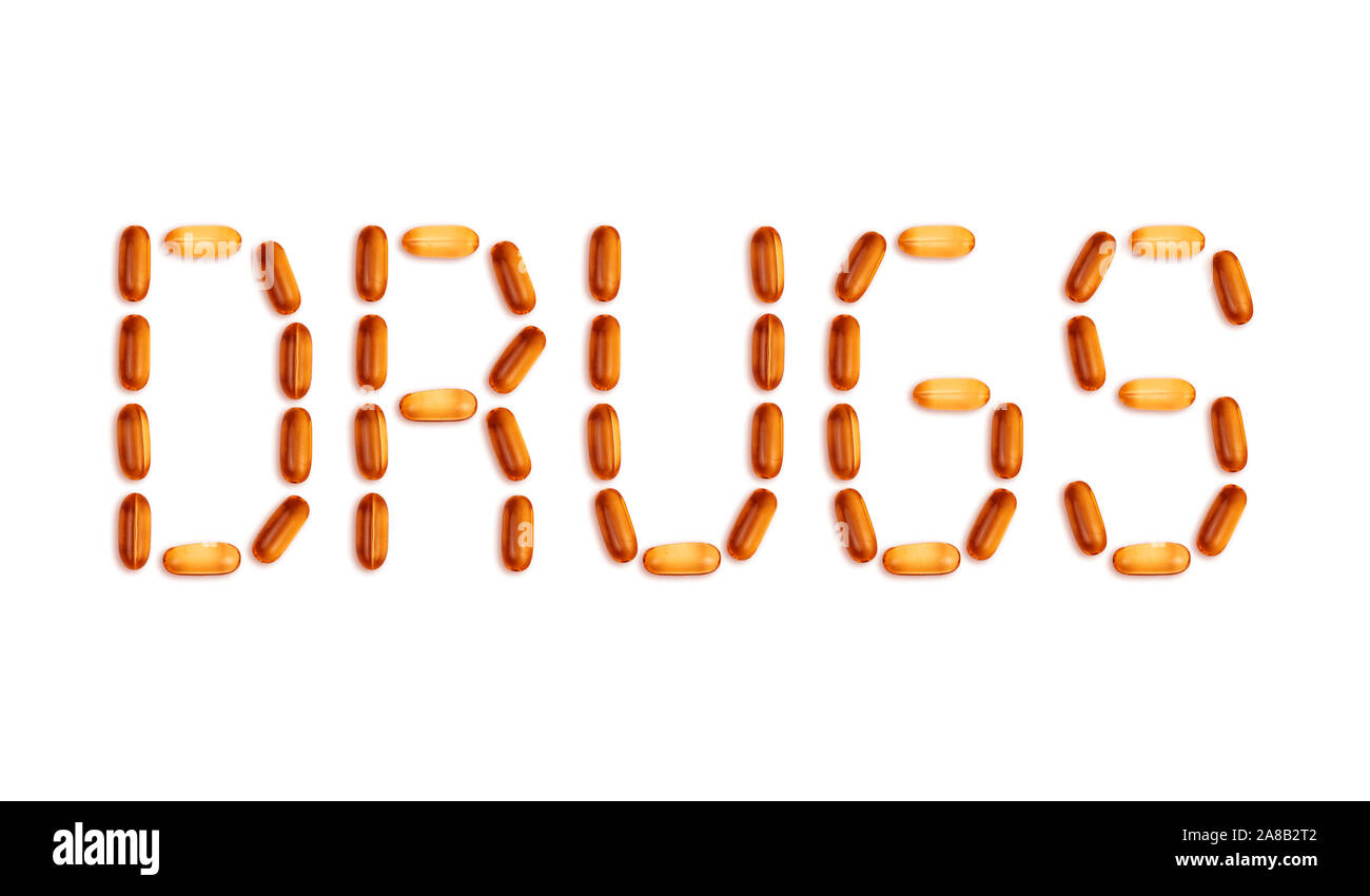 The word Drugs is laid out with pills. The word Drugs is laid out with ...