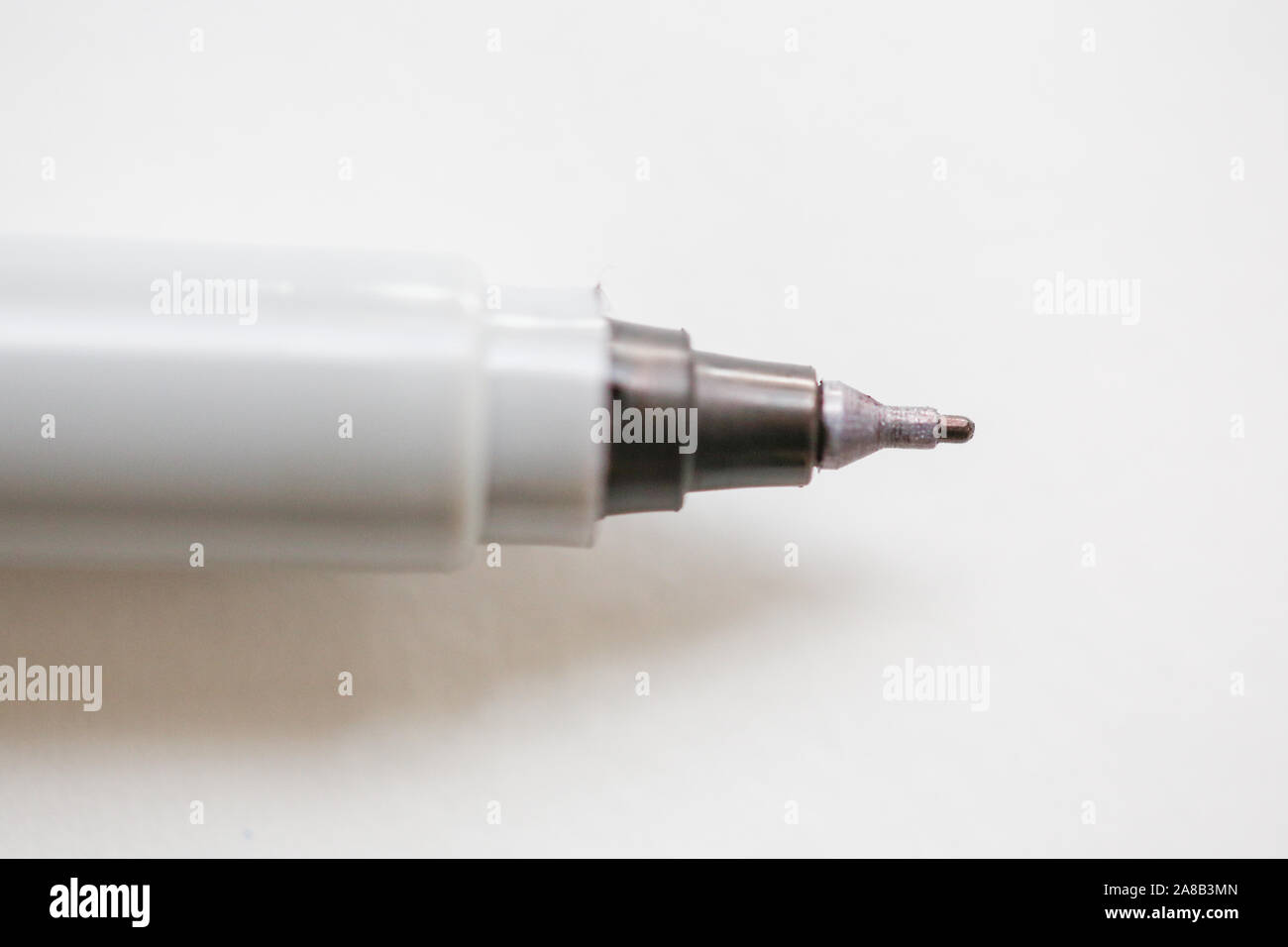 Pen point close-up on white background - Image Stock Photo - Alamy
