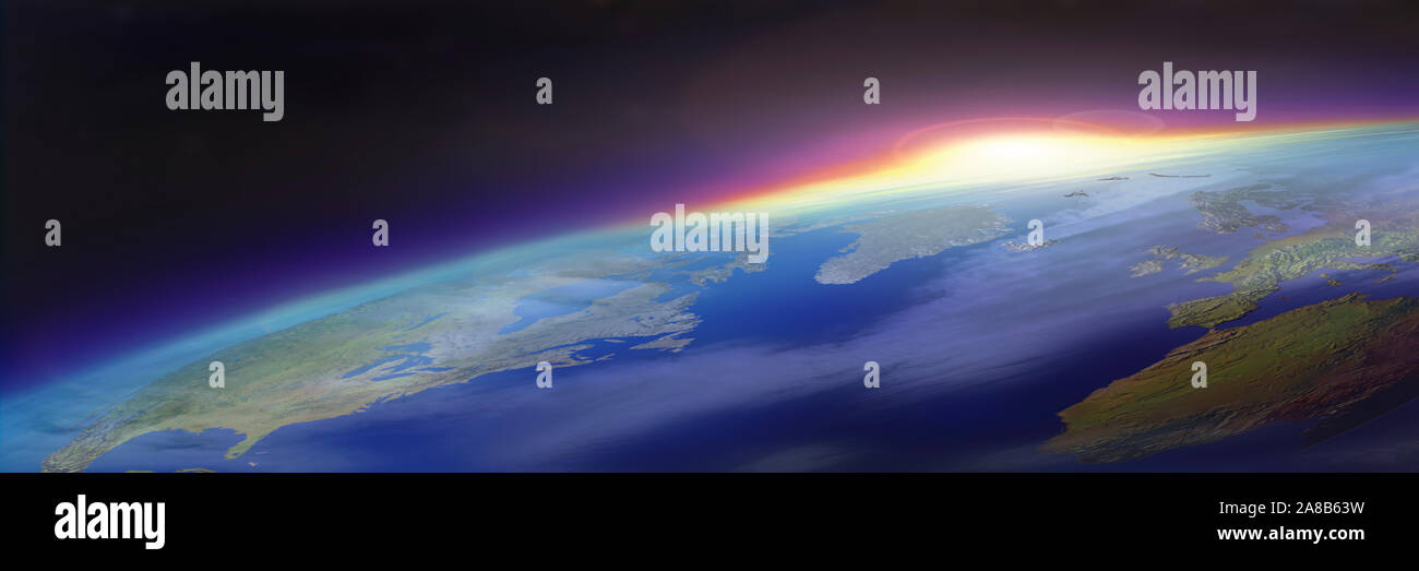 Sun rising over the earth Stock Photo - Alamy