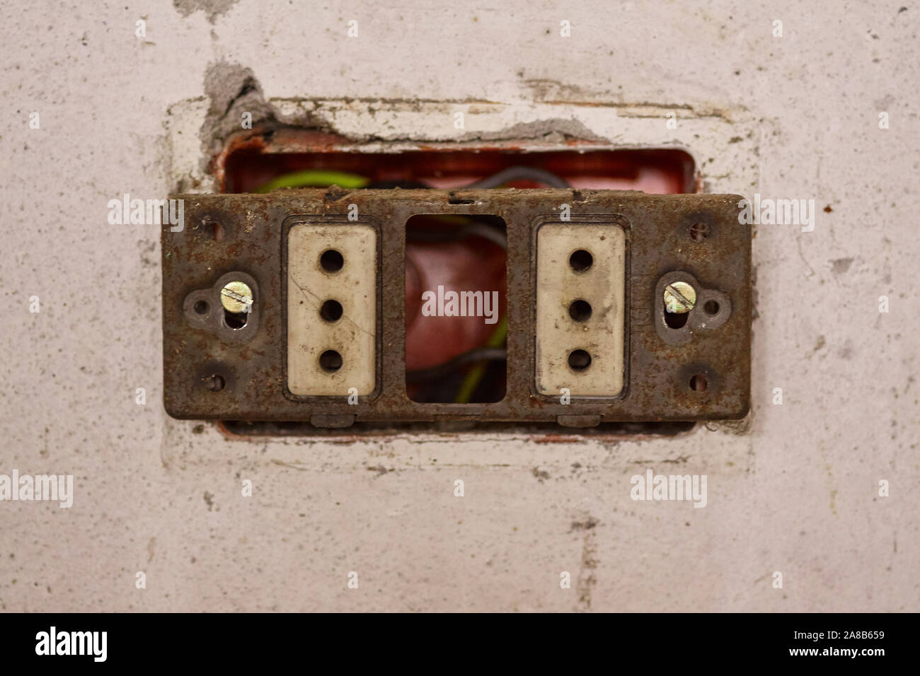 Absolutely unsafe electrical socket Stock Photo - Alamy