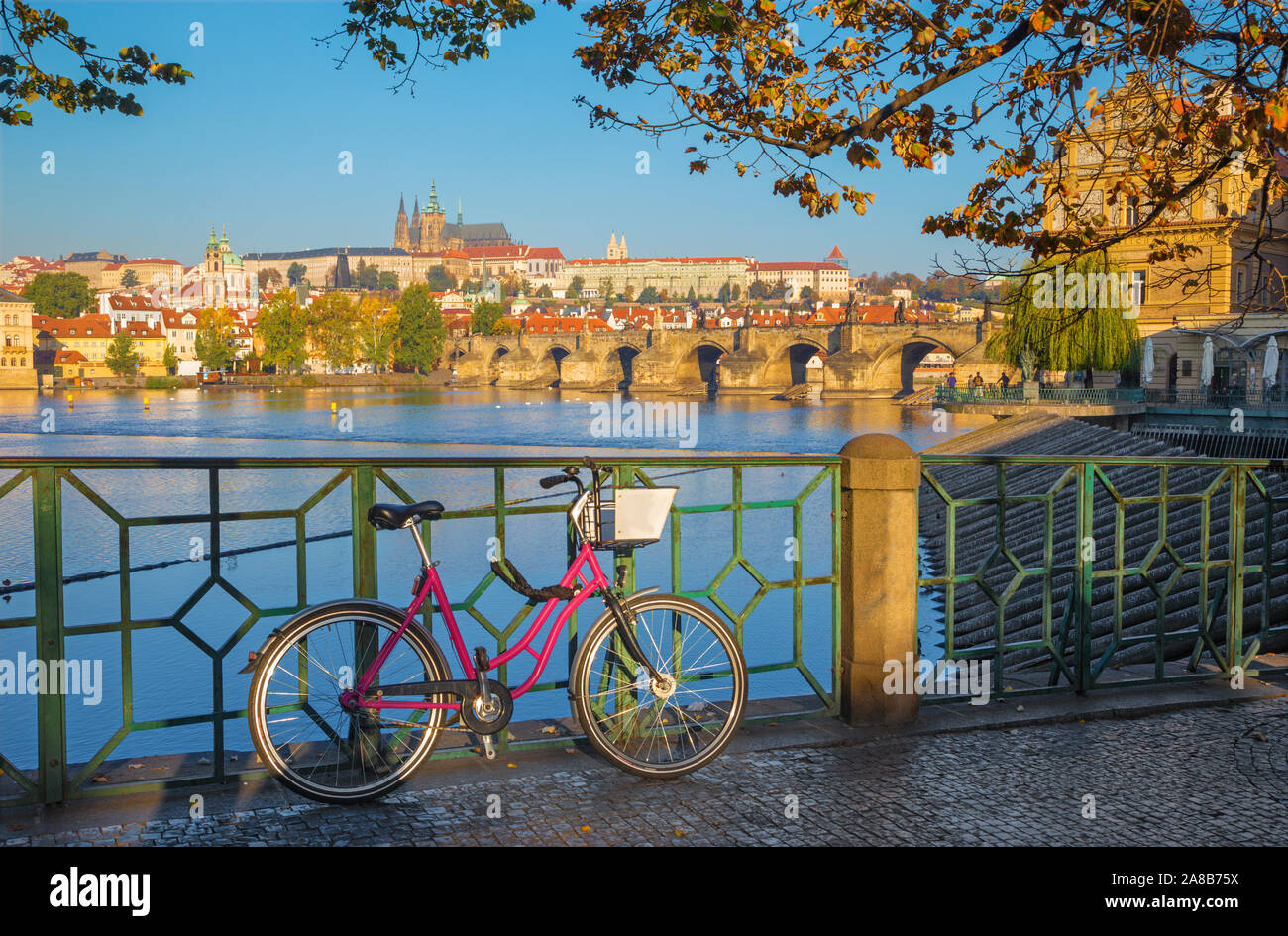 Prague - The rental bike on the waterfront,Charles Bridge, Castle and ...