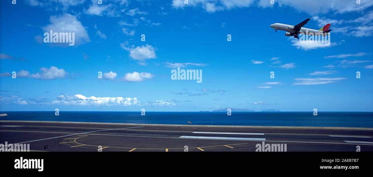 Airplane taking off from a runway, Funchal Airport, Funchal, Madeira ...