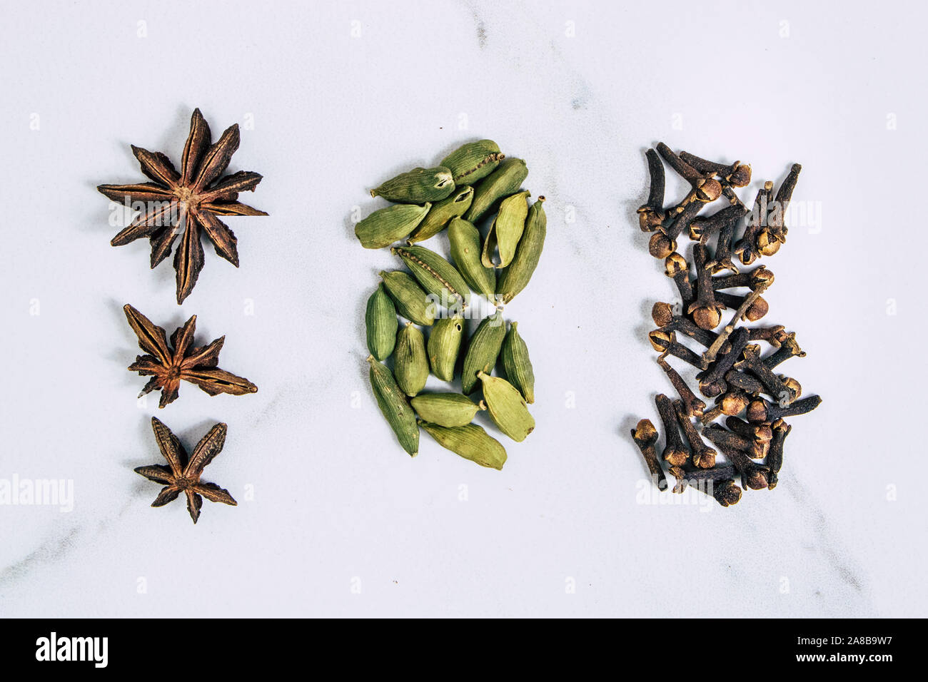 Star Anise, Green Cardamon, & Whole Cloves Isolated Up-close on White ...
