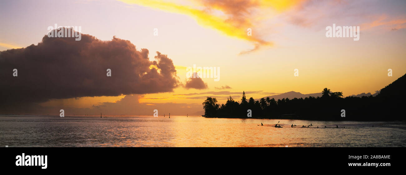 Sunset over the ocean, Tahiti, French Polynesia Stock Photo - Alamy