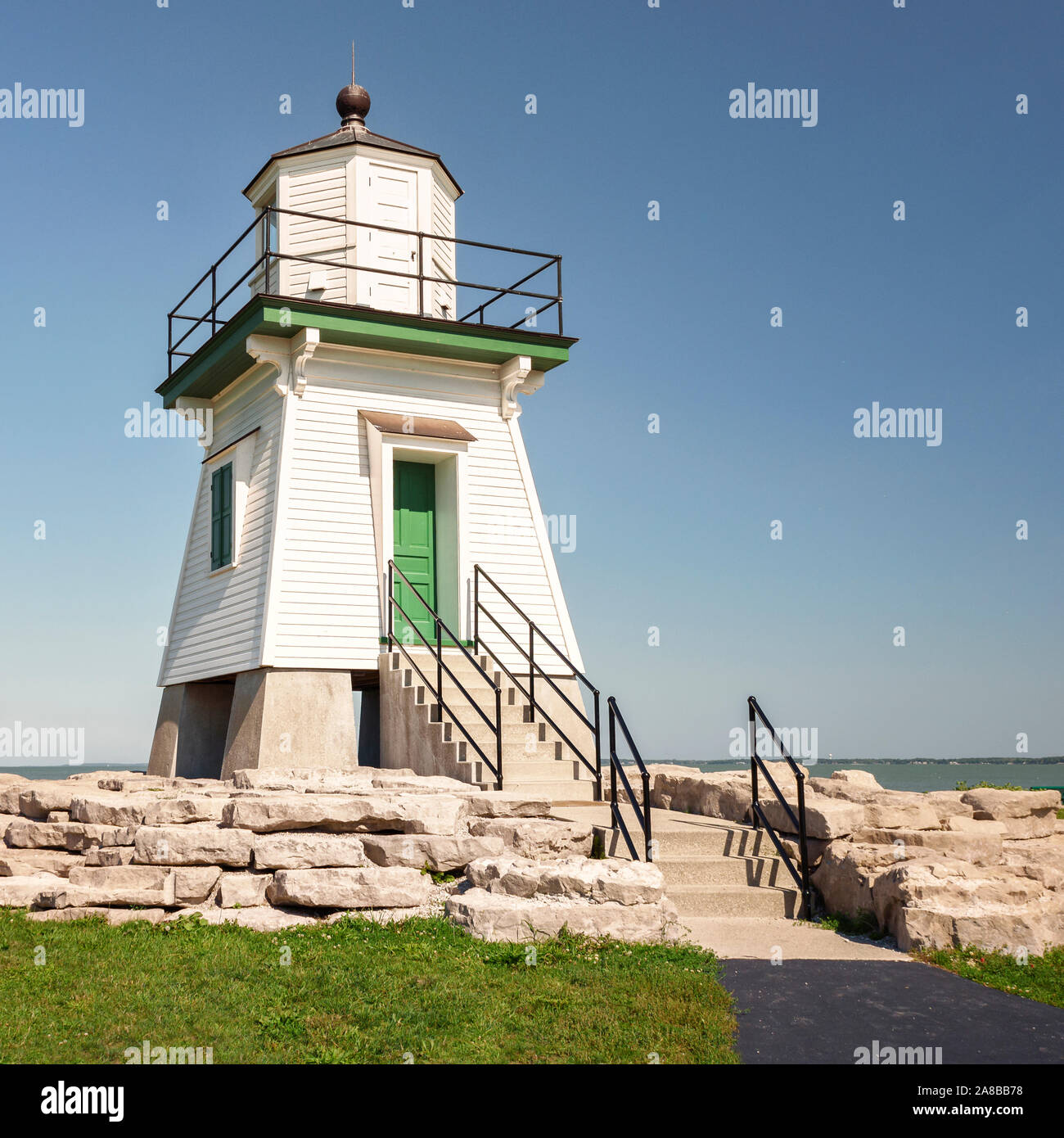 Port Clinton Light Station close view of white and green wooden ...