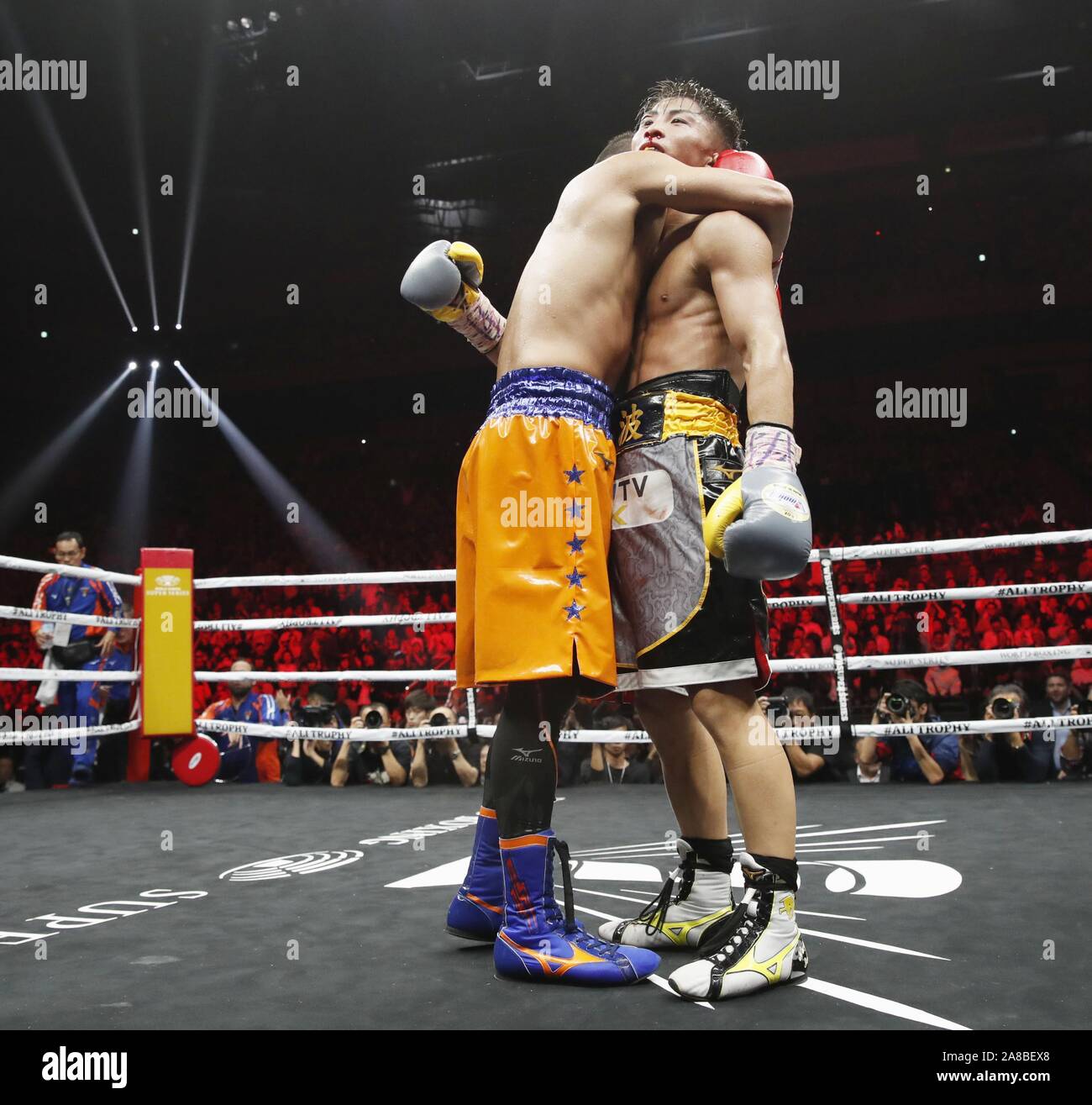 Japan's Naoya Inoue (R) and Nonito Donaire of the Philippines hug after ...