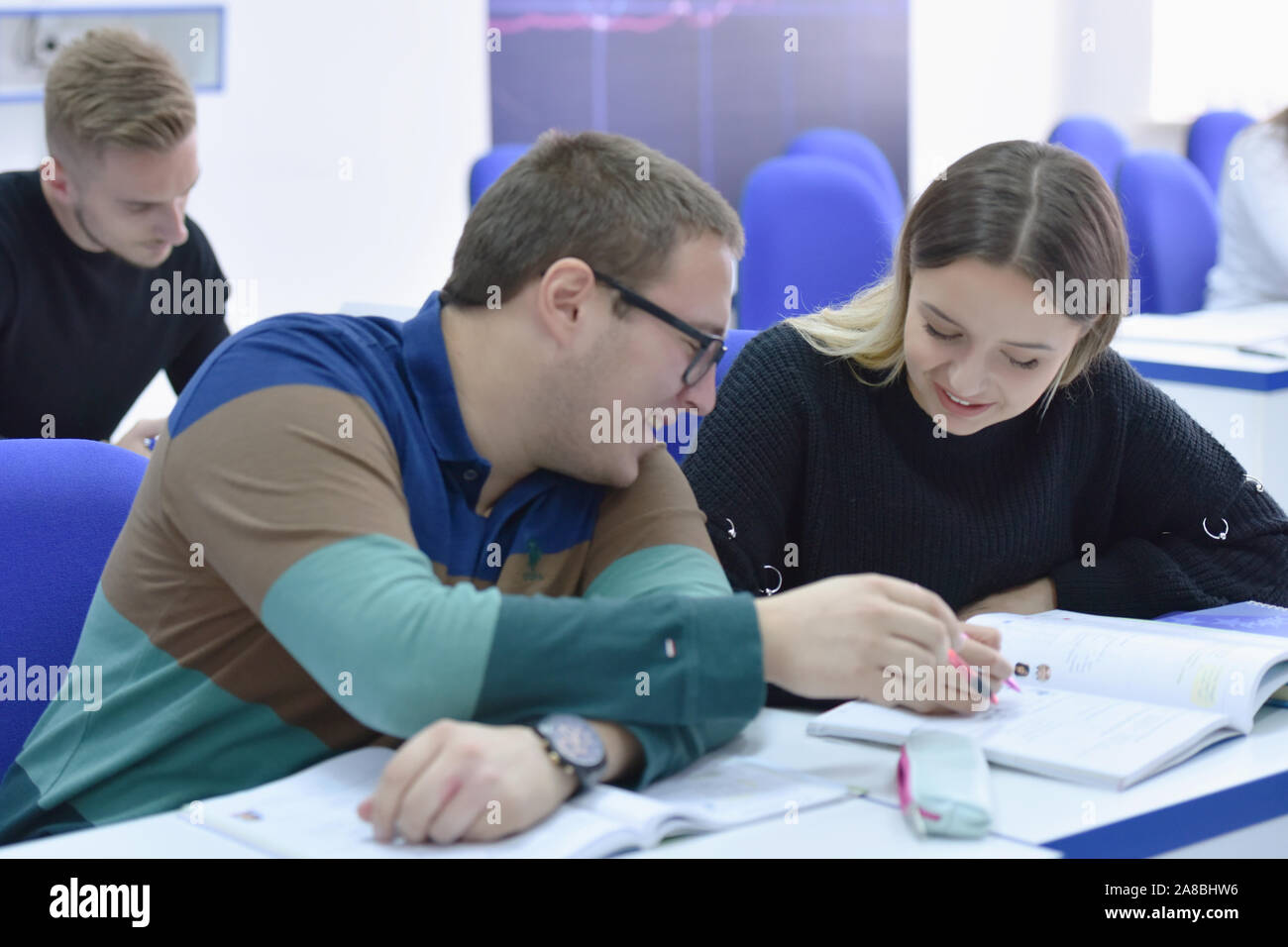 Students during the class. Resolving problems together. Team work ...