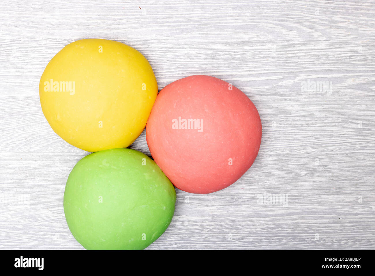 Red and yellow play dough, hi-res stock photography and images - Alamy