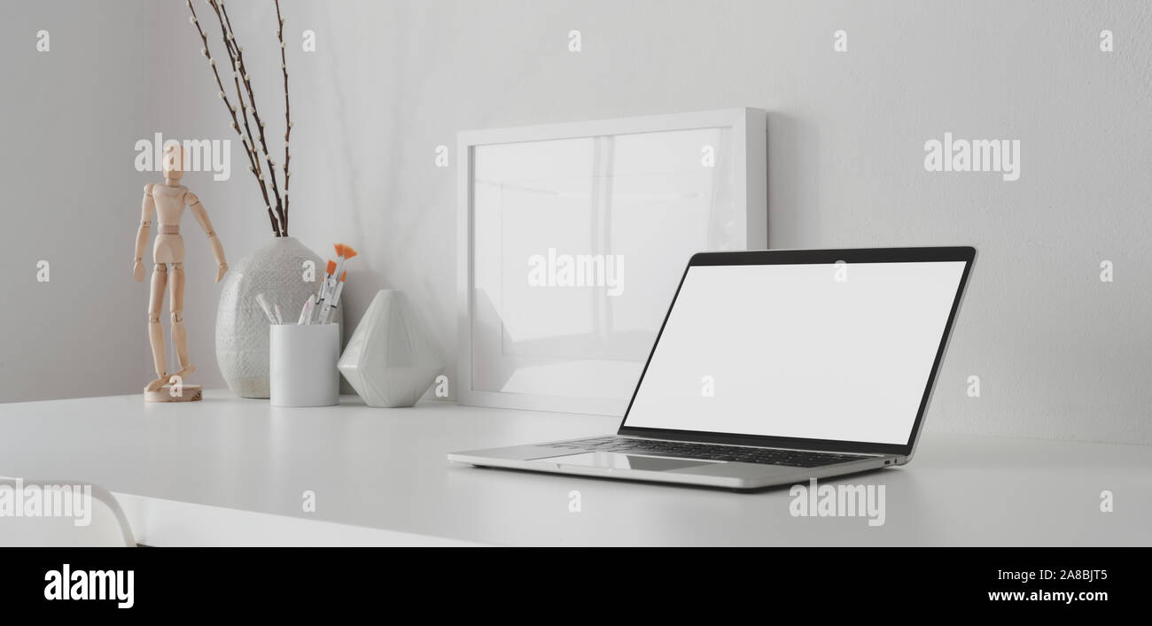 Modern workspace with open blank screen laptop computer and mock up ...